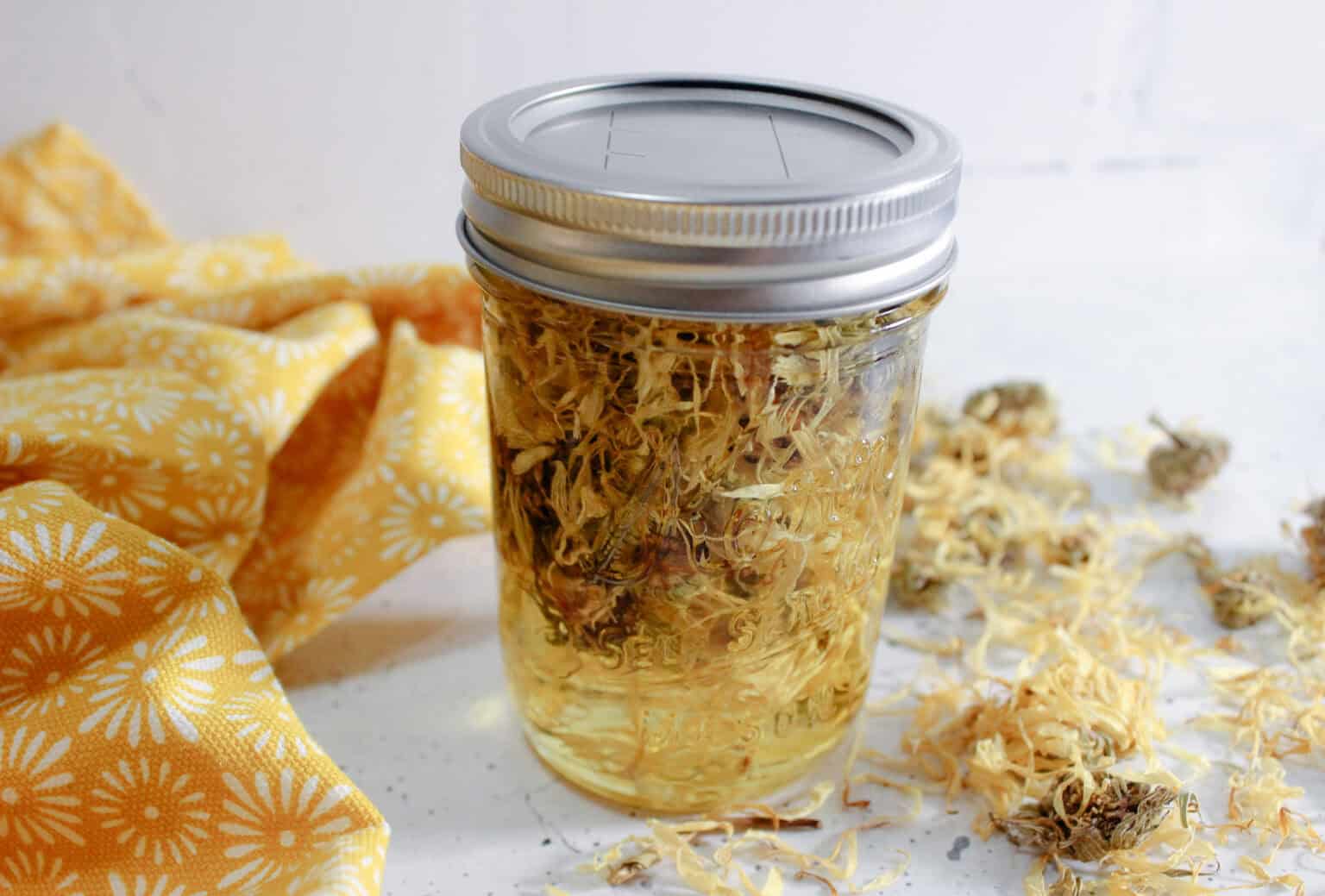 Homemade Calendula Infused Oil (Two Easy Methods) - She Needs Coffee