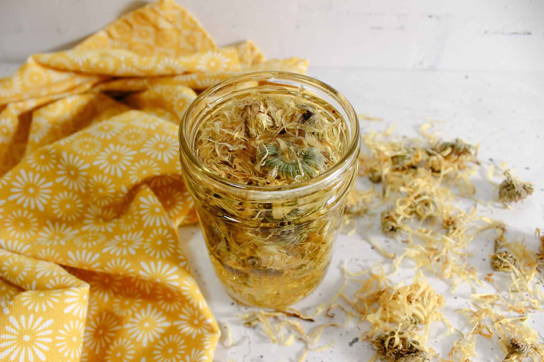Homemade Calendula Infused Oil (Two Easy Methods) - She Needs Coffee