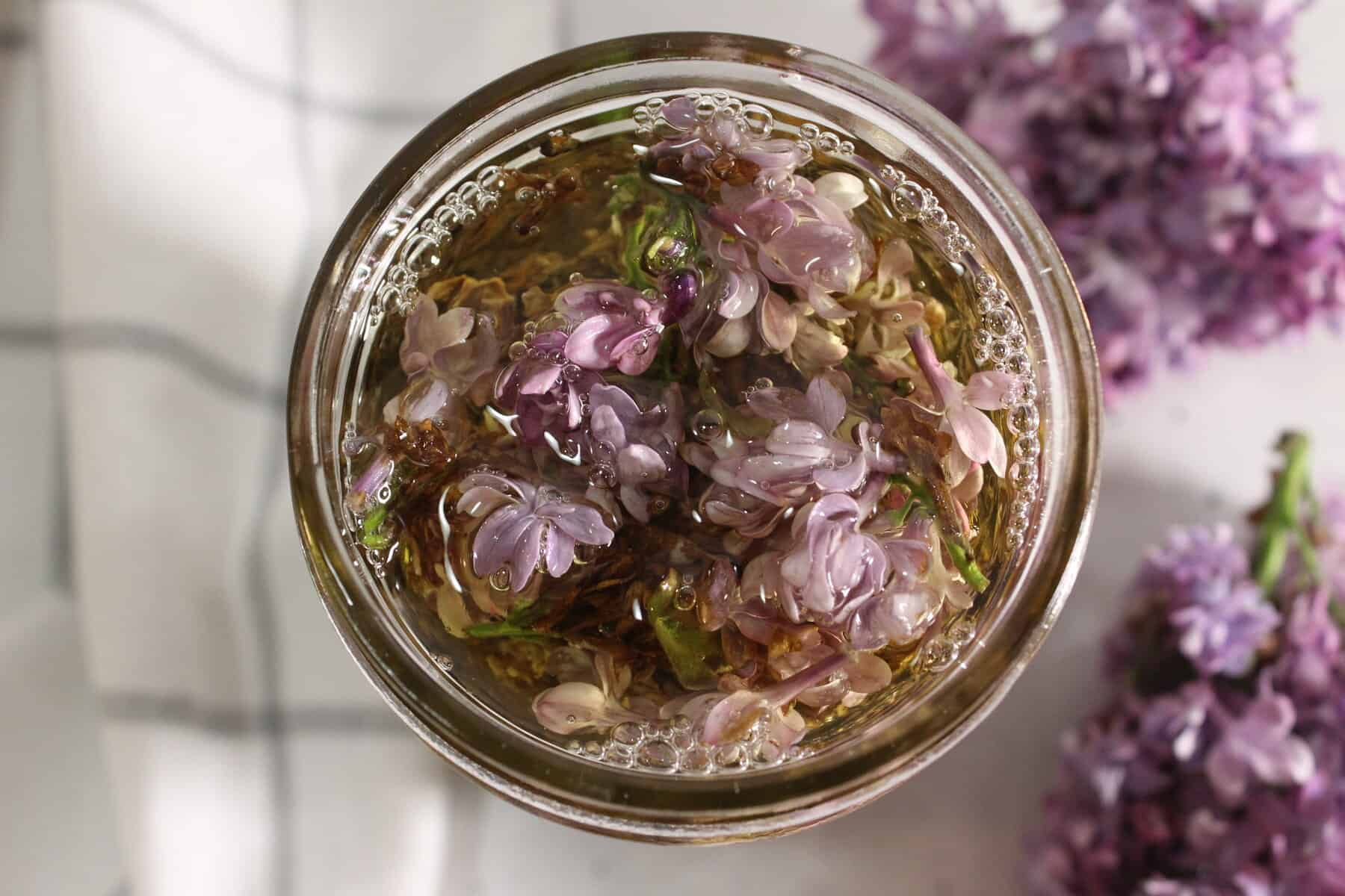 Relaxing Lilac Infused Oil Recipe for Natural Skincare - She Needs Coffee